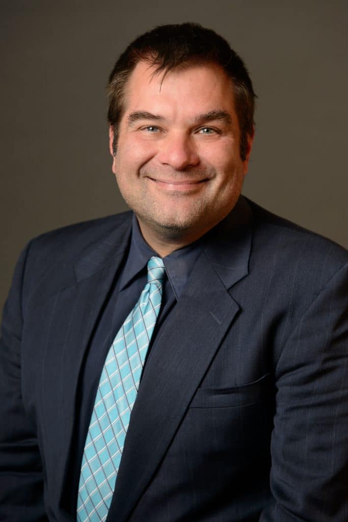 Eric Bush, MD, RPh, MBA, Chief Medical Officer - Your Health Magazine